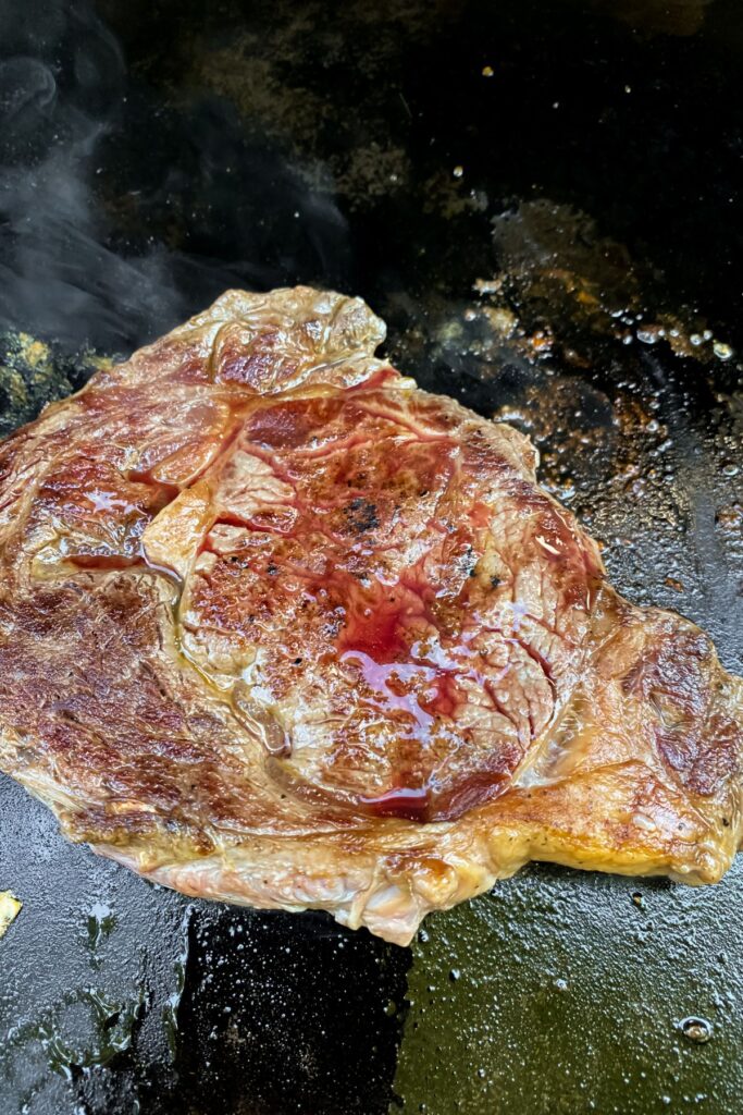 Juicy Ribeye on the Blackstone Griddle - Lara Clevenger